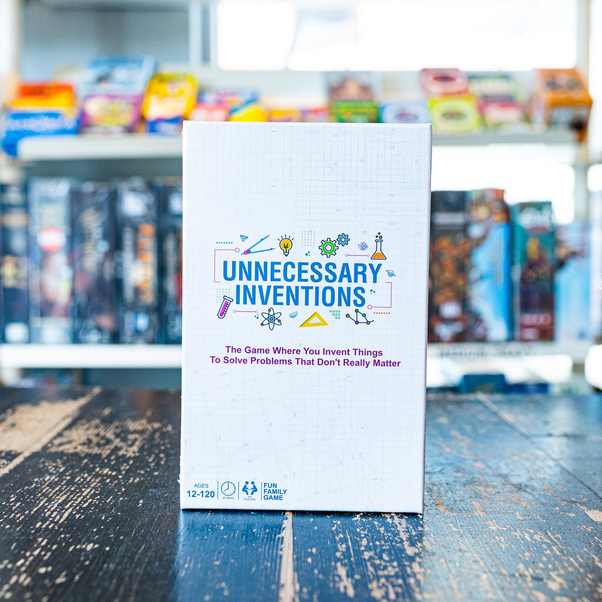 Unnecessary Inventions – The Hexagon Board Game Cafe